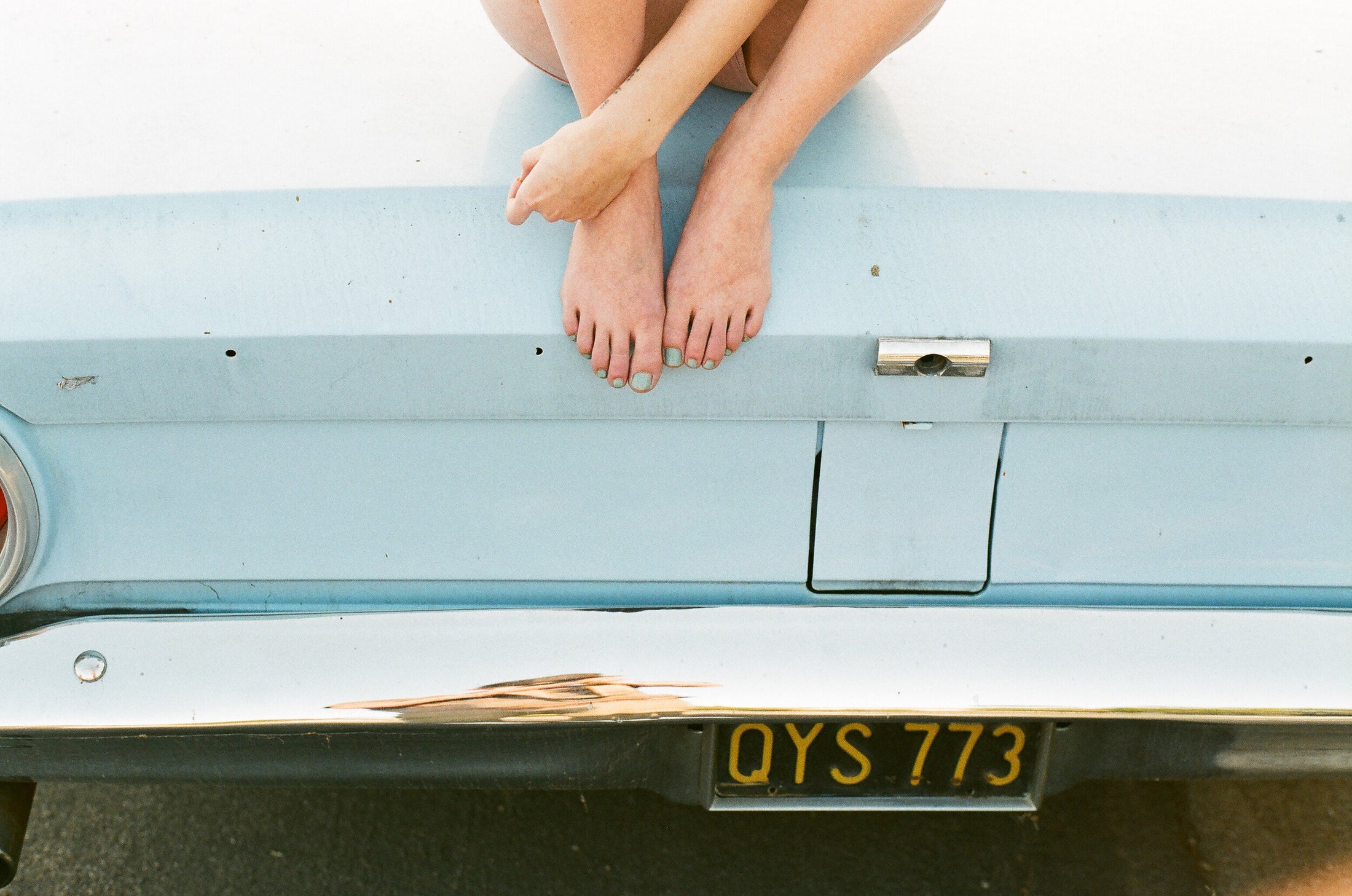 Feet On A Car by Josh Soskin